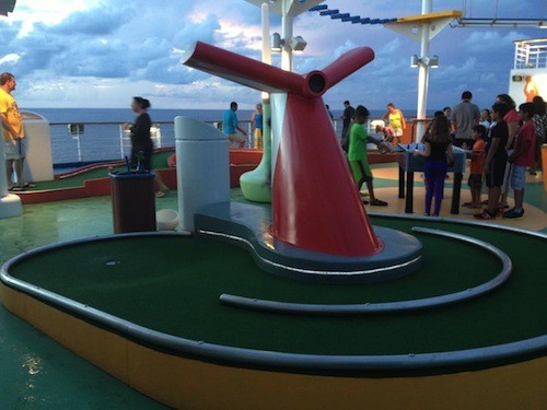 Golfing on Carnival Magic - The Vactation Gals